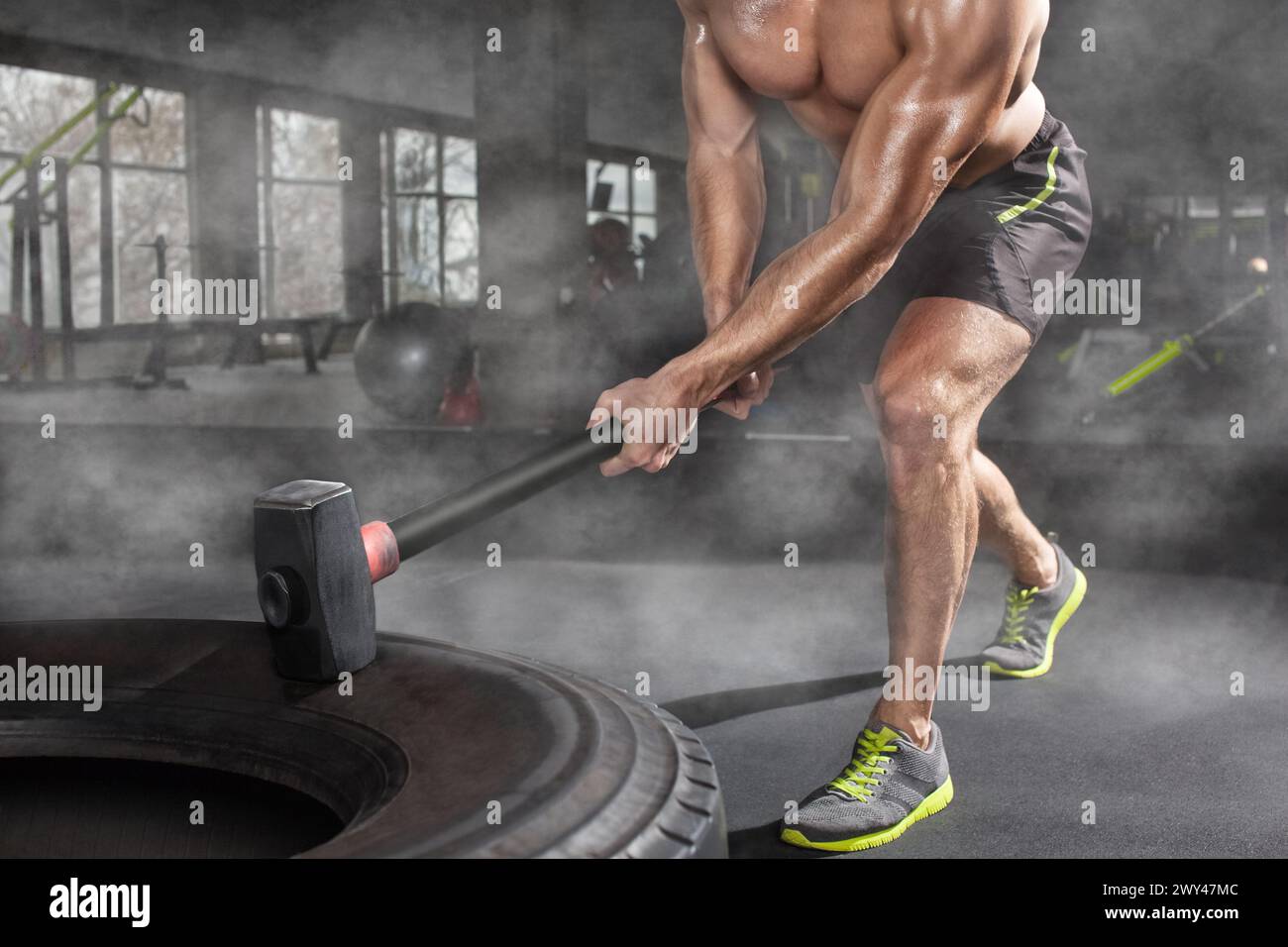 Crossfit sledge hammer man workout hi-res stock photography and images ...
