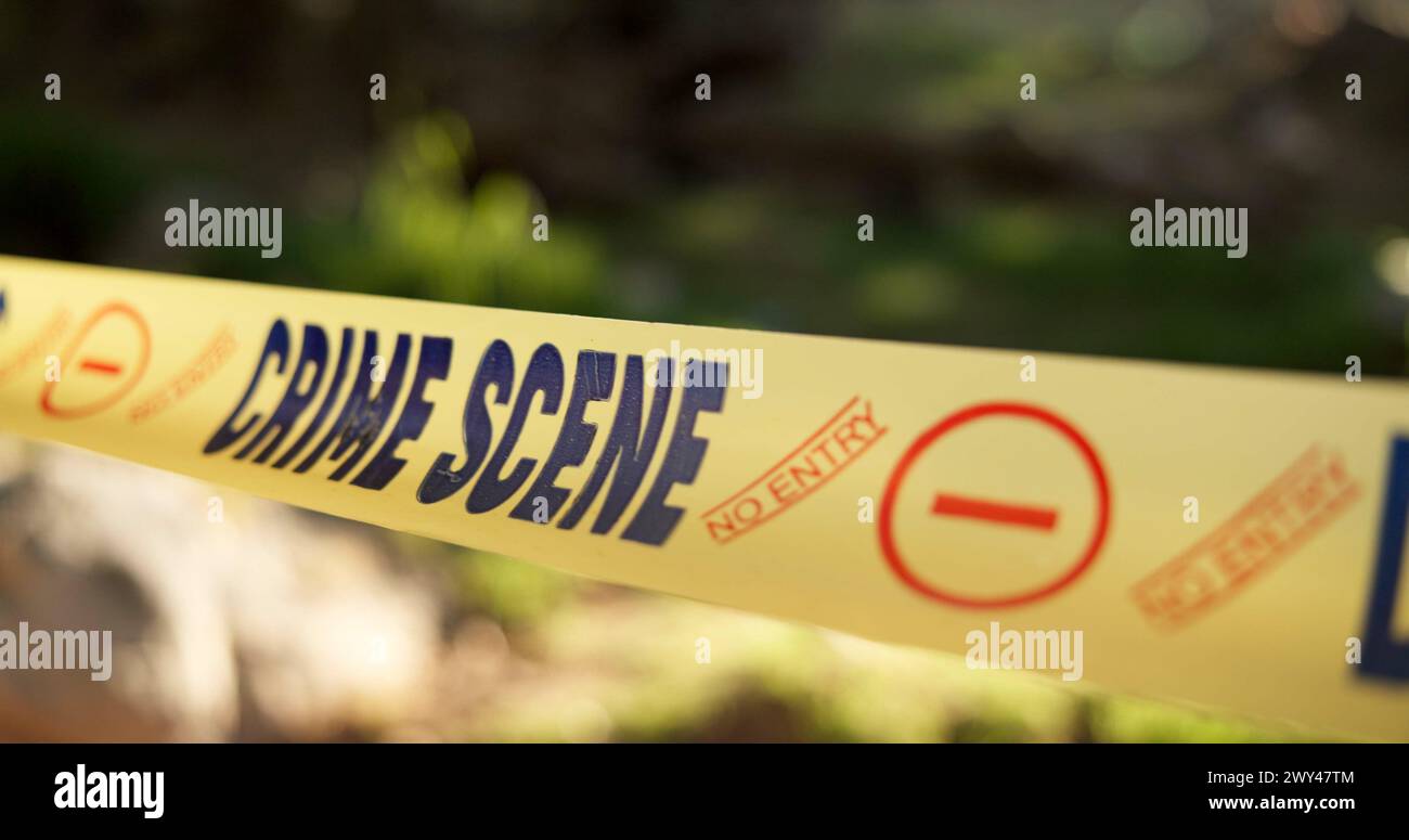 Police, yellow line or crime scene in outdoor for emergency, homicide ...