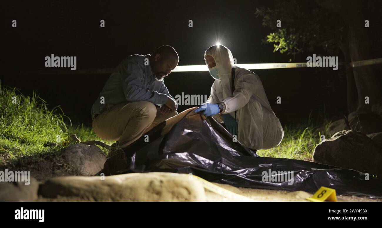 Crime scene, murder and investigator outdoor with forensics teamwork ...