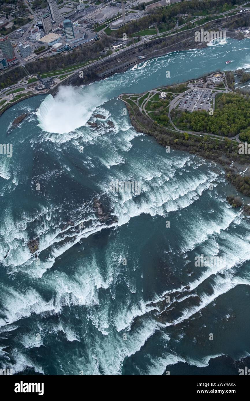 Aerial view of Niagara Falls from the Niagara River, the natural border ...