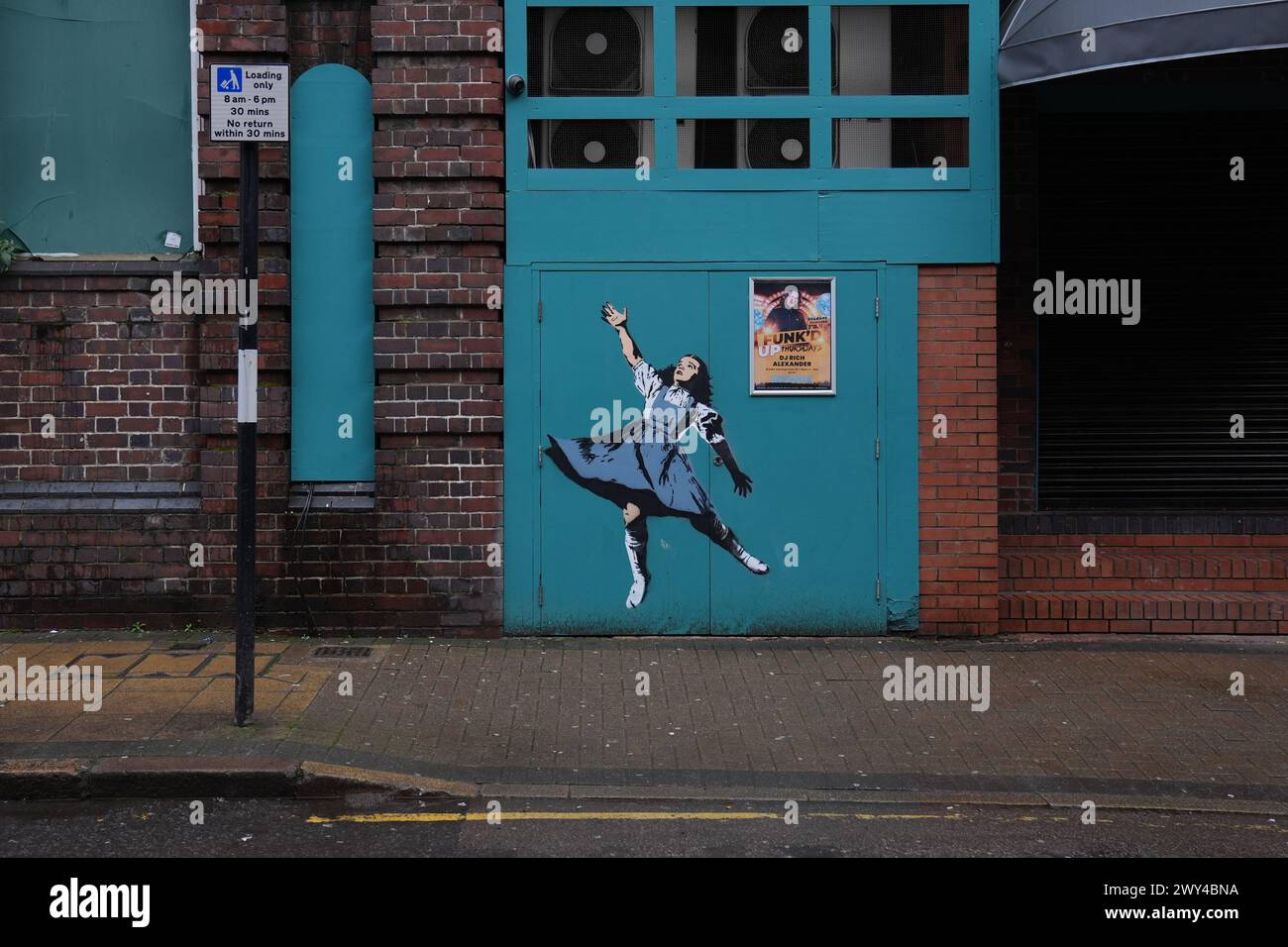 A mural depicting Dorothy from the Wizard of Oz, which could be the ...