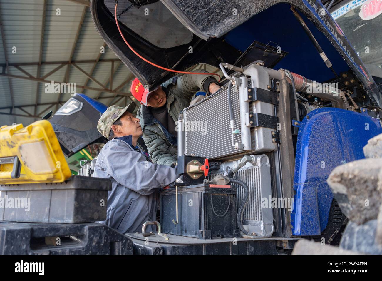 Harbin, China's Heilongjiang Province. 3rd Apr, 2024. Workers maintain ...