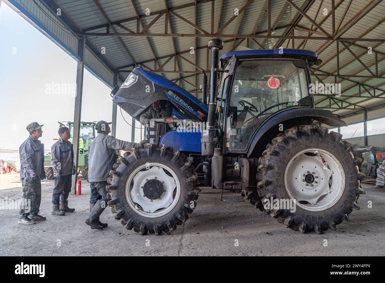 Harbin, China's Heilongjiang Province. 3rd Apr, 2024. Workers maintain ...
