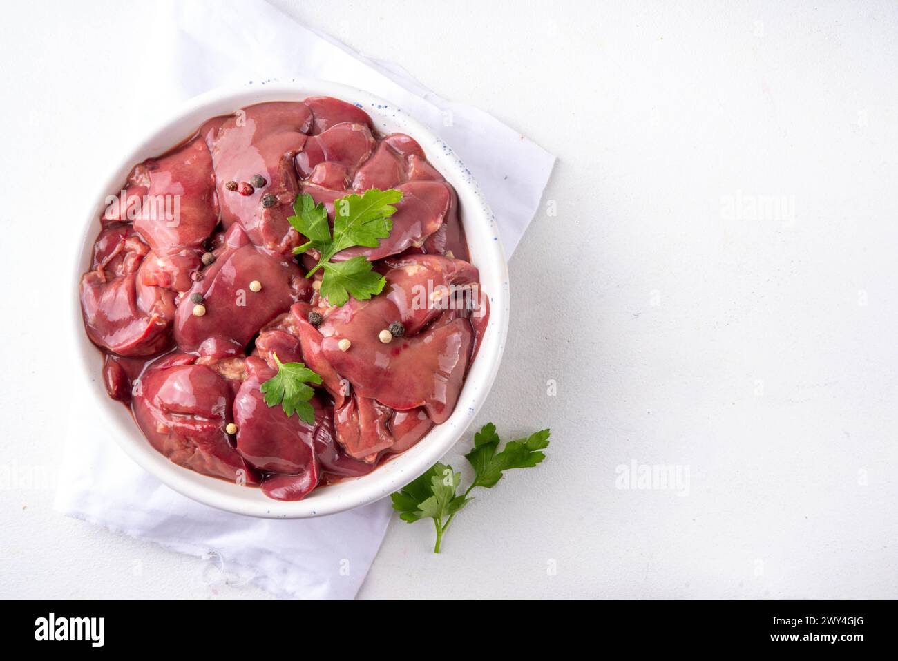 Raw chicken, turkey, duck, poultry liver with herbs and spices. Poultry ...
