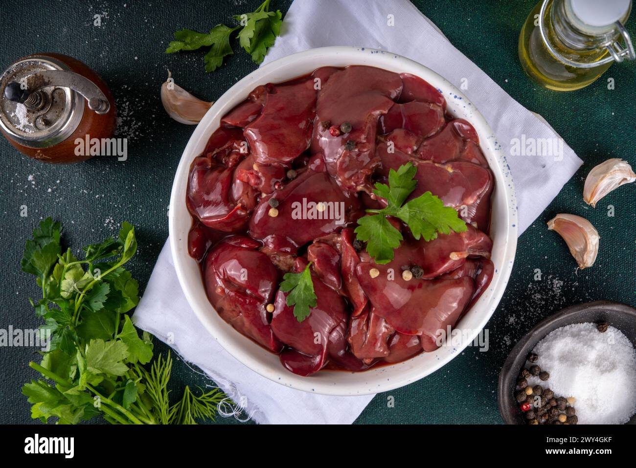 Raw chicken, turkey, duck, poultry liver with herbs and spices. Poultry ...