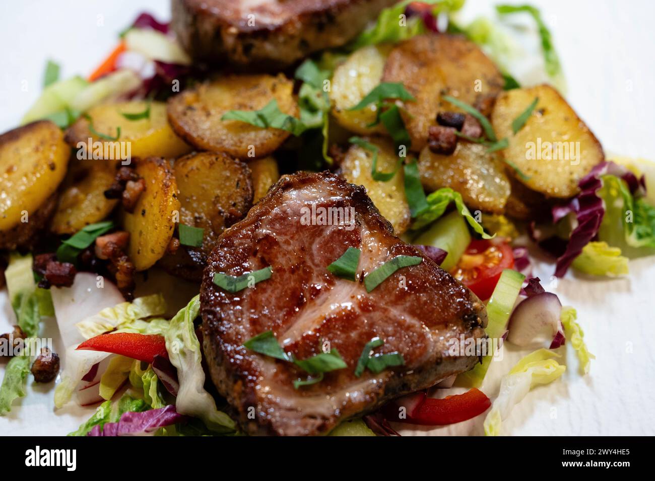 fried pork neck steak called noble roast Stock Photo - Alamy