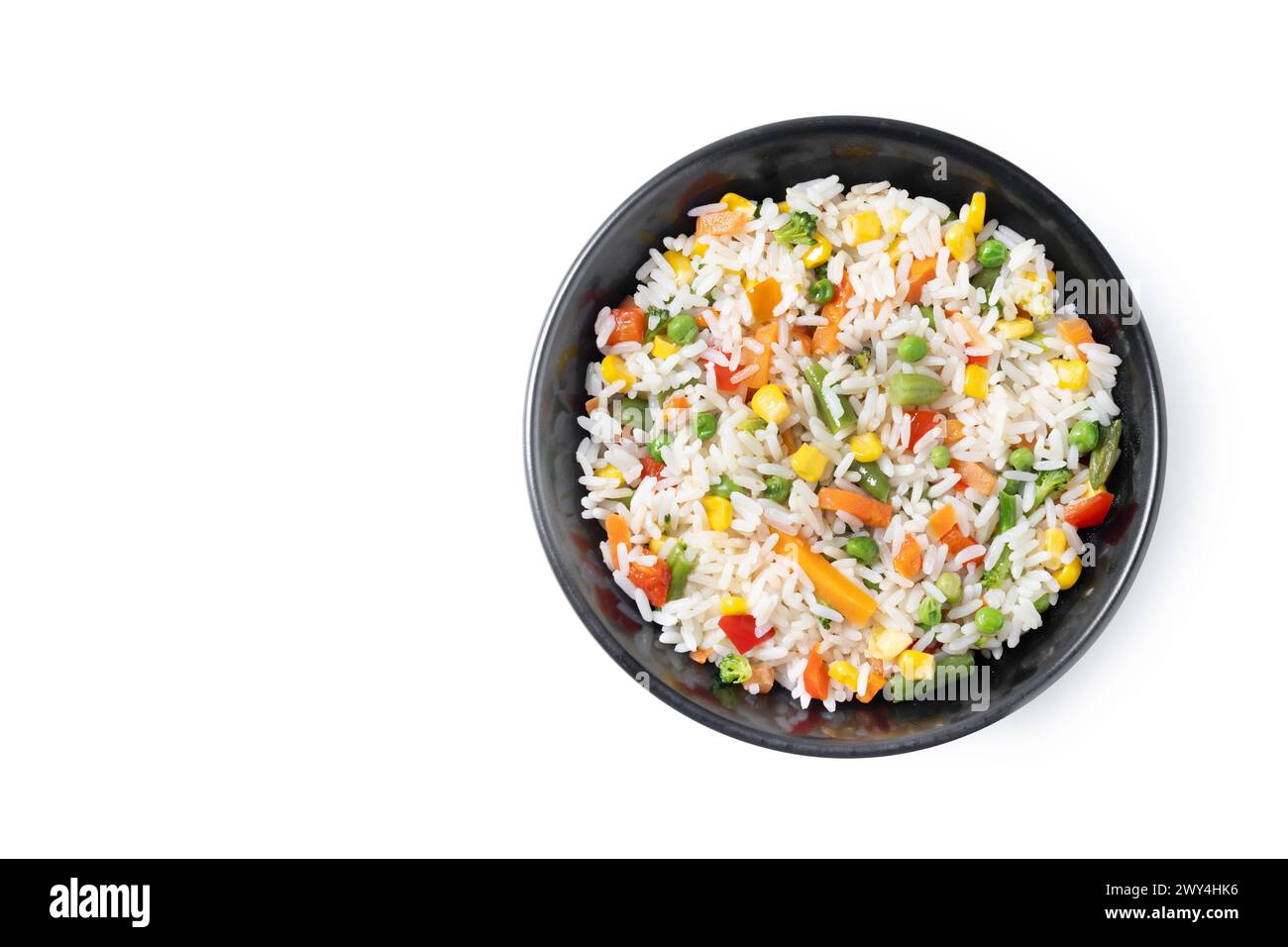 White rice with vegetables in a black bowl isolated on white background ...