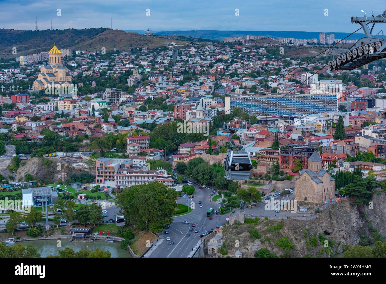 Cable car passing over Tbilisi in Georgia Stock Photo - Alamy