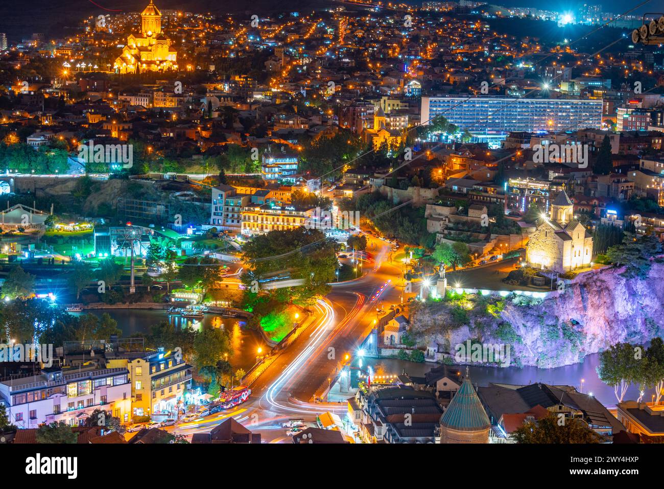 Sunset view of Metekhi Virgin Mary Assumption Church and holy trinity ...