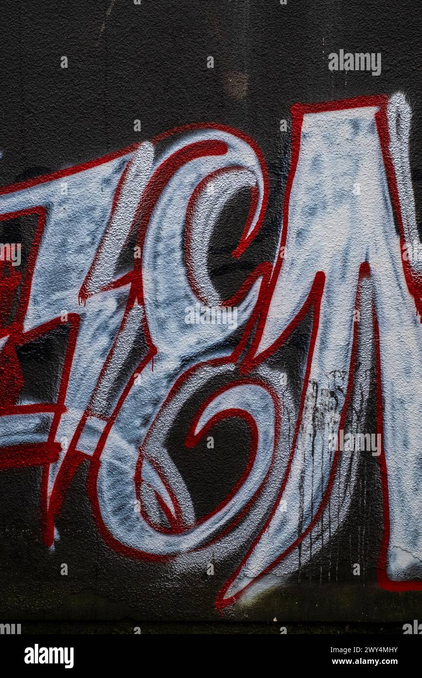 A section of graffiti sprayed on a wall in Newquay Town centre in ...