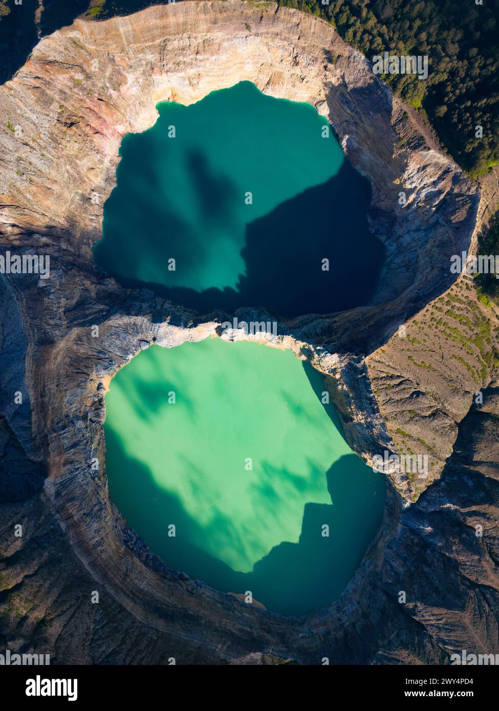 An aerial view of Kelimutu National Park's crater lakes on Flores ...