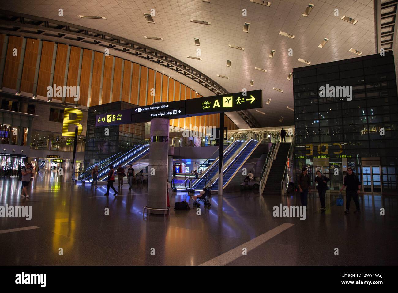 Hamad International Airport Terminal with all gates and Travellers ...