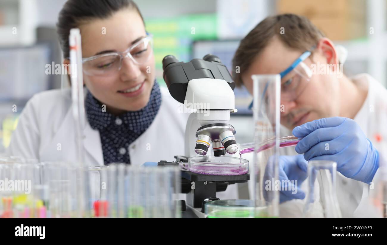 Laboratory assistants conduct chemical examination Stock Photo - Alamy