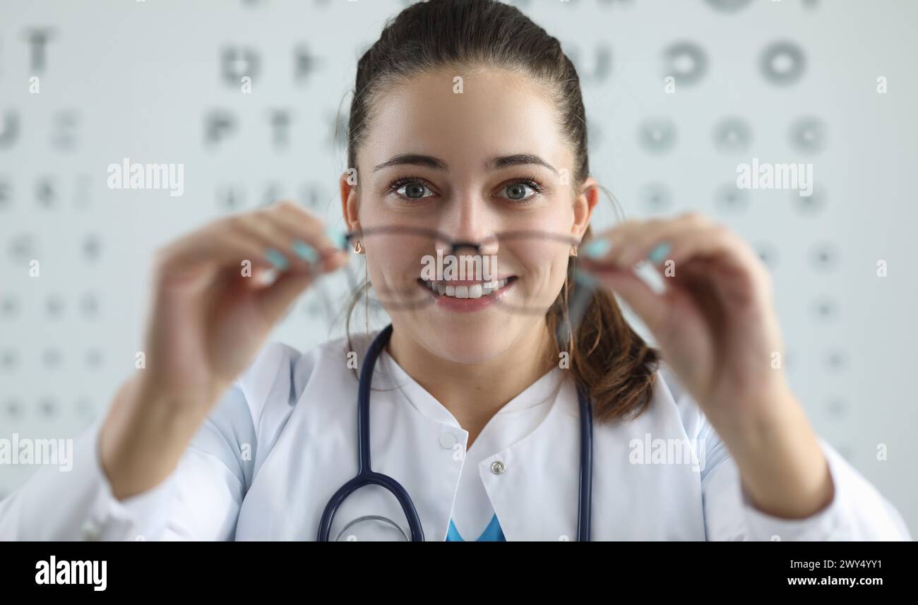 Happy pretty woman with stethoscope Stock Photo - Alamy