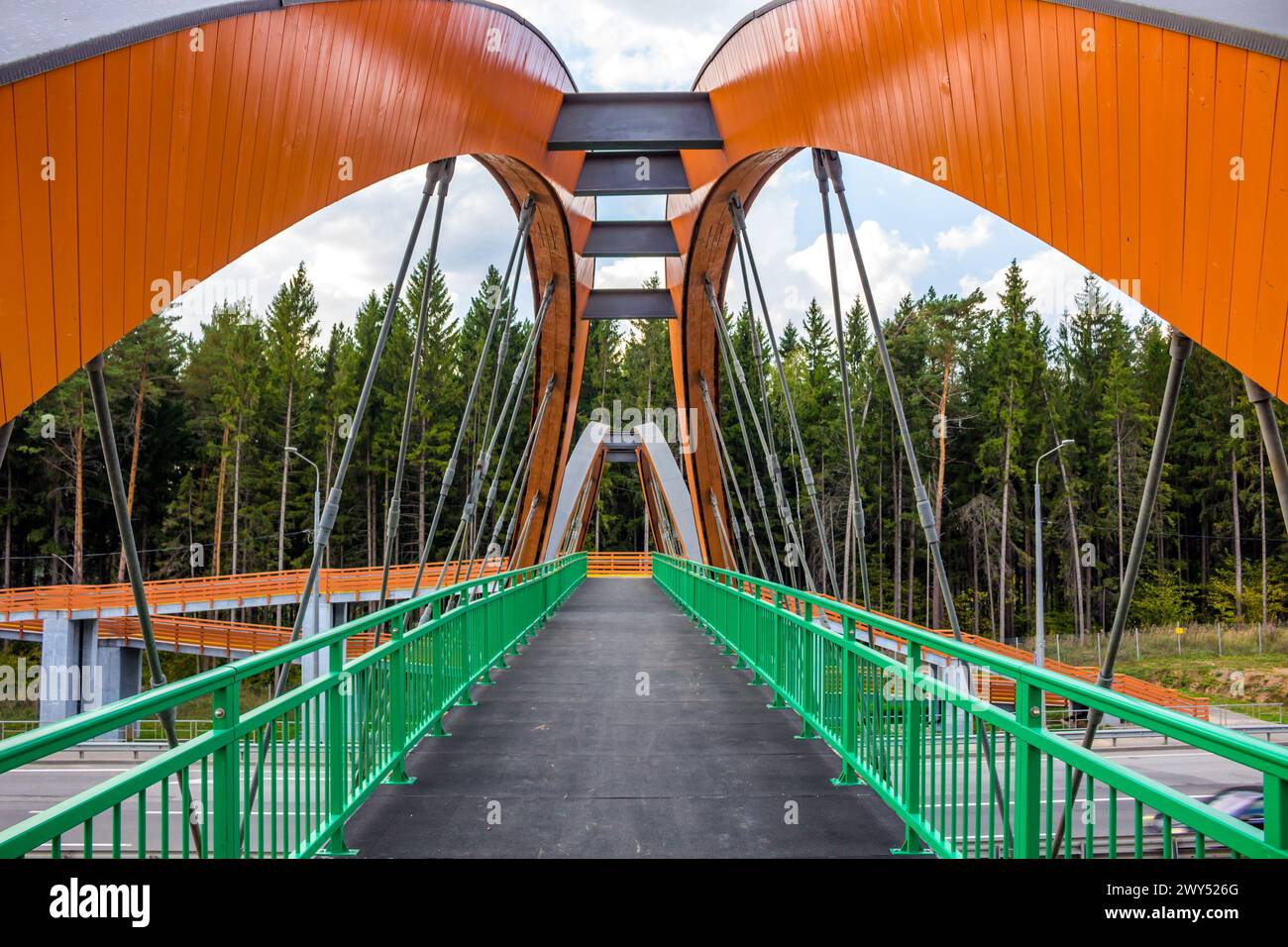 Overhead pedestrian crossing on the highway, bridge Stock Photo - Alamy