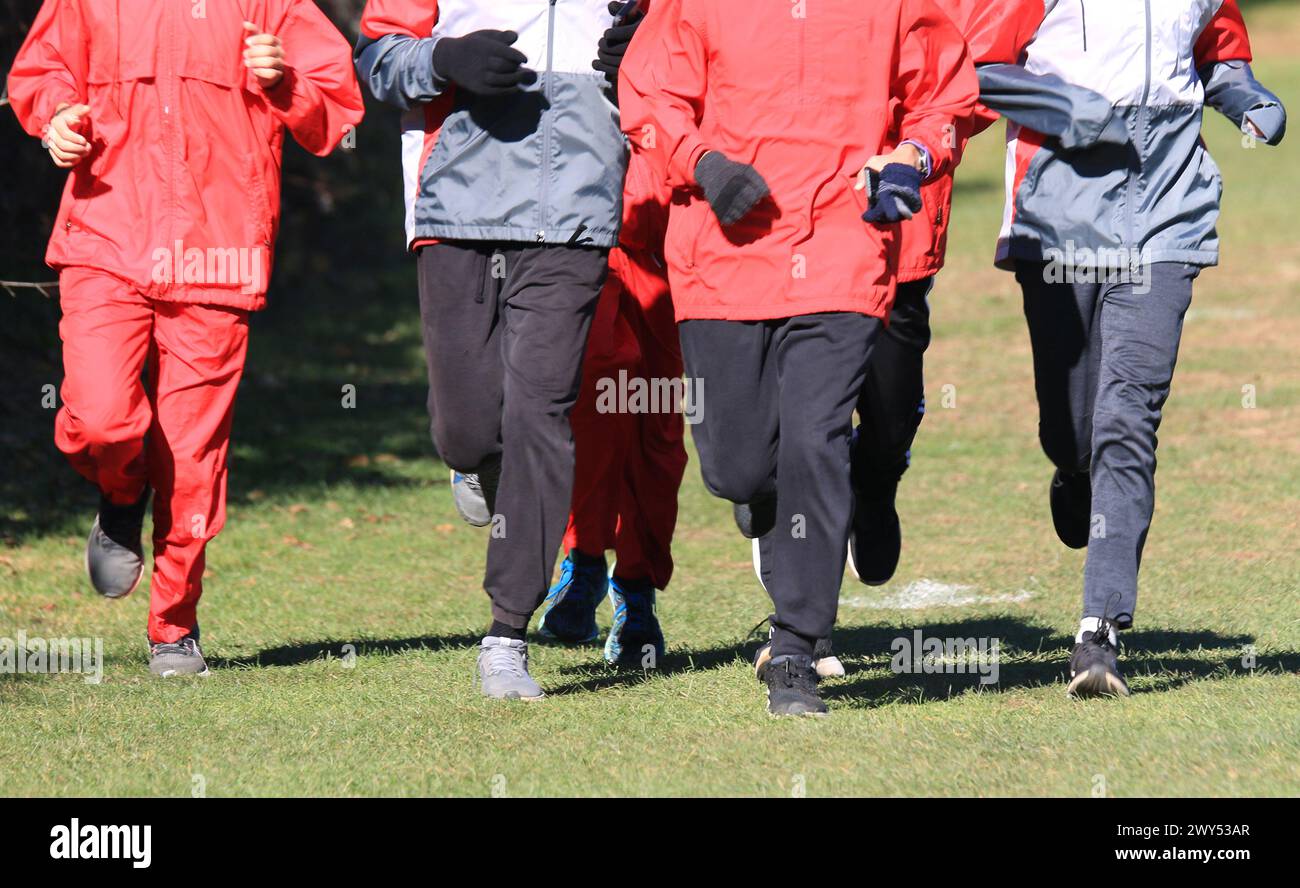 Athletes running together across open hi-res stock photography and ...