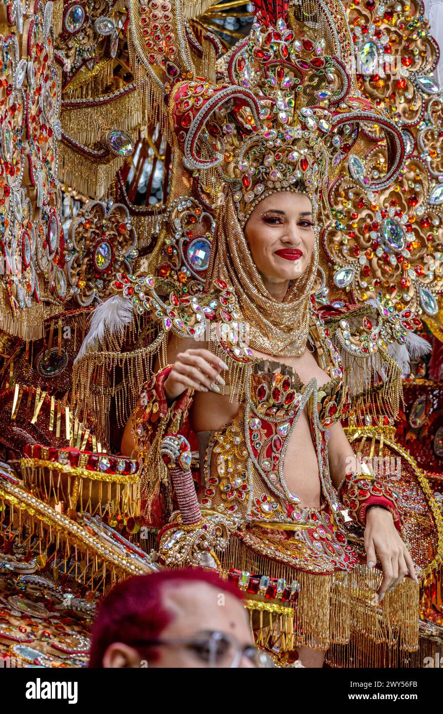 Woman in elaborate costume on enormous decorated float in tenerife ...