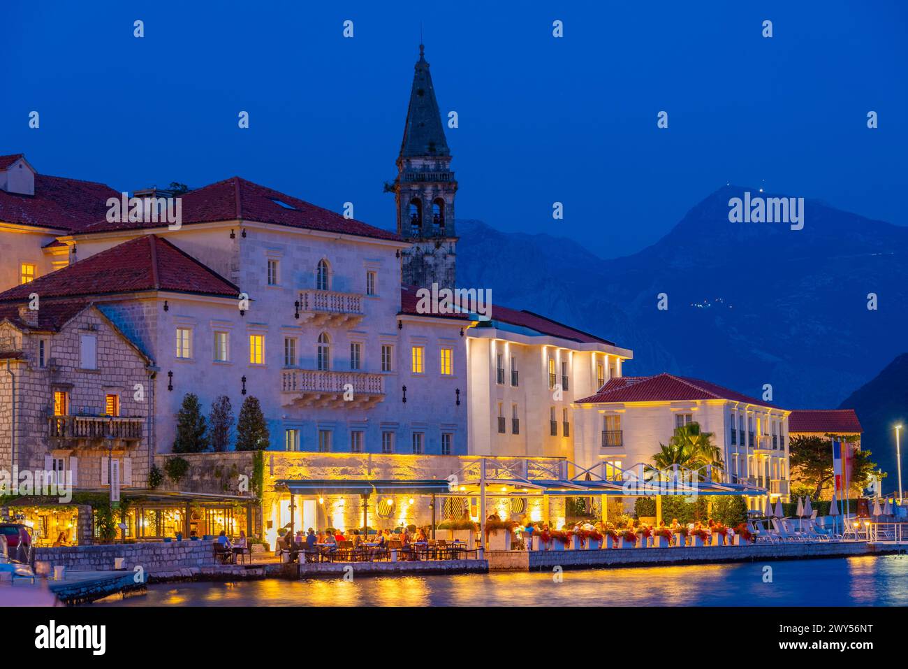 Sunset view of Perast town in Montenegro situated at Boka Kotorska bay ...