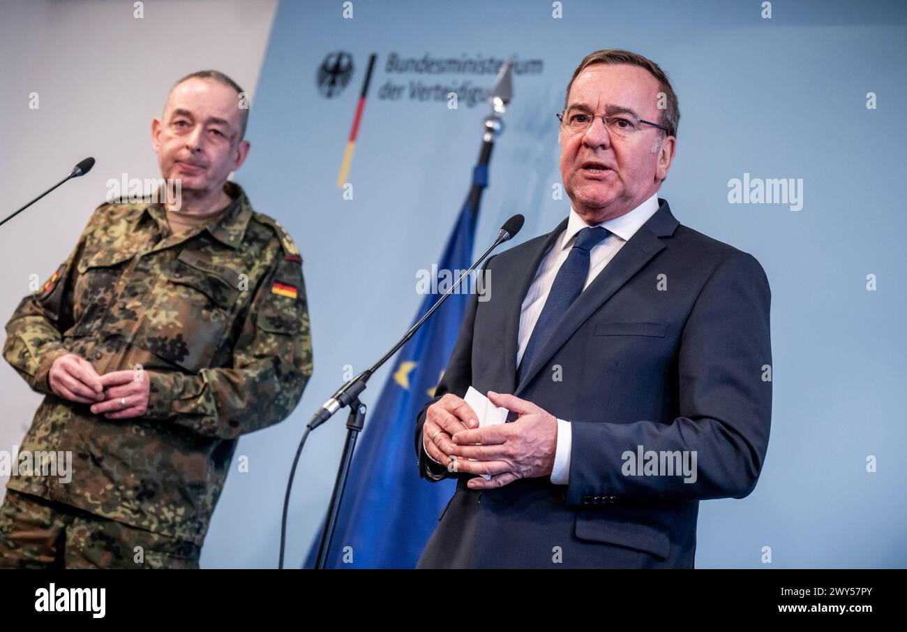 04 April 2024, Berlín: Boris Pistorius (right), Germany's Minister of ...