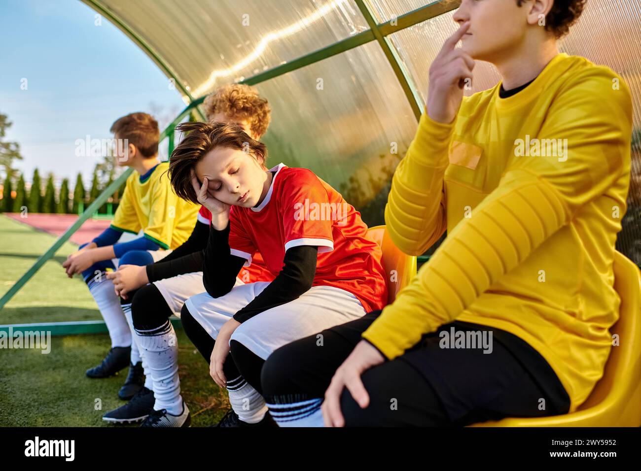 A diverse group of young people of various ethnicities and genders ...