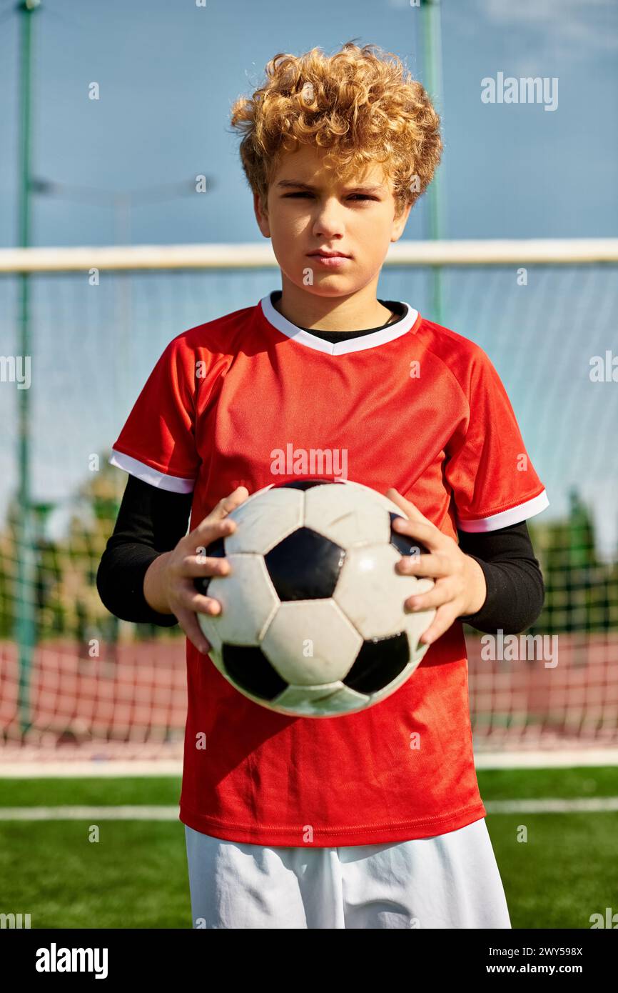 Kid chest soccer ball hi-res stock photography and images - Alamy