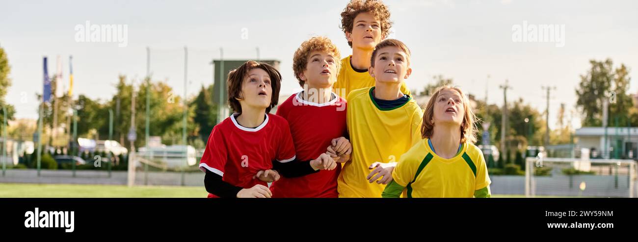 A diverse group of youthful individuals stands together in unity ...