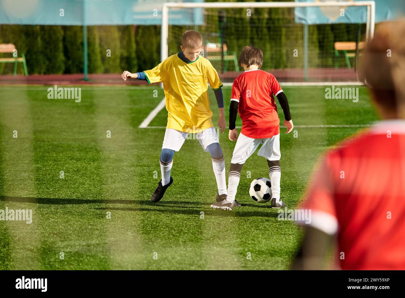 Two friends playing football hi-res stock photography and images - Alamy