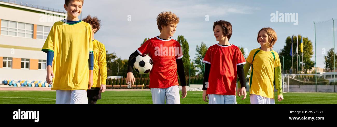 A group of young men, dressed in soccer gear, stand shoulder to ...