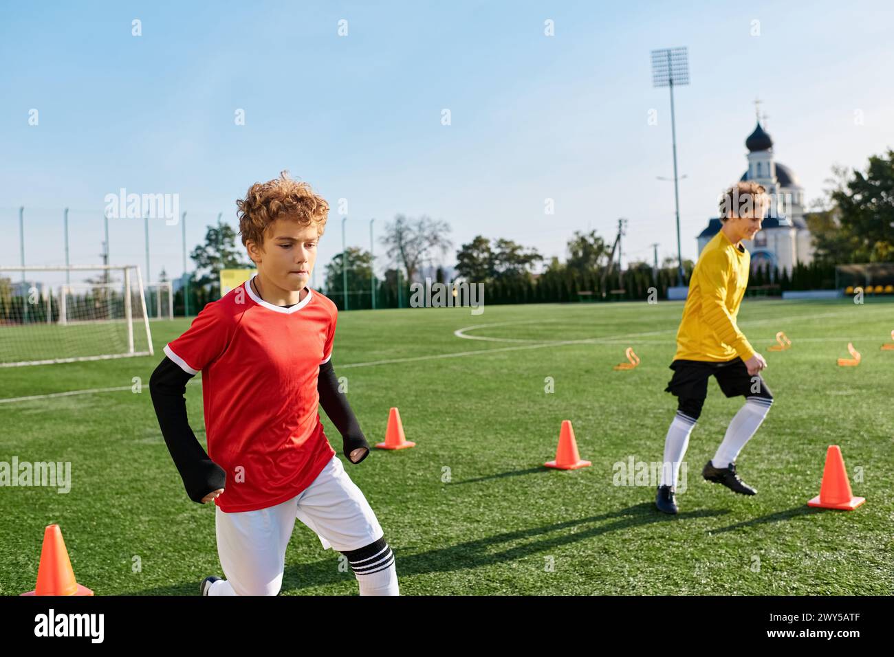 Two friends playing football hi-res stock photography and images - Alamy