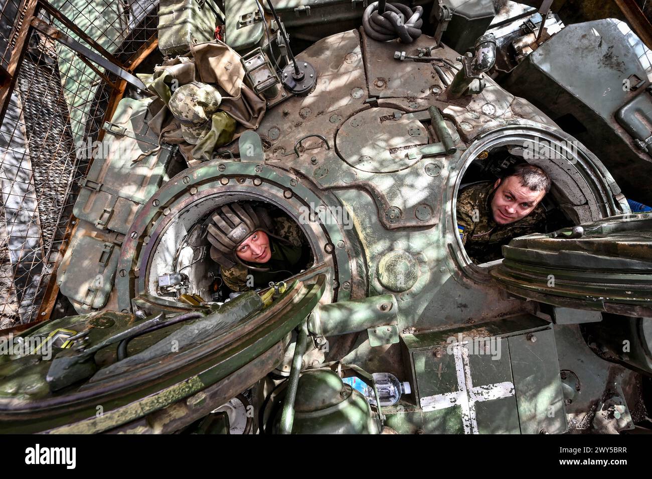 UKRAINE - MARCH 31, 2024 - Two servicemen of the 1st Tank Brigade of ...