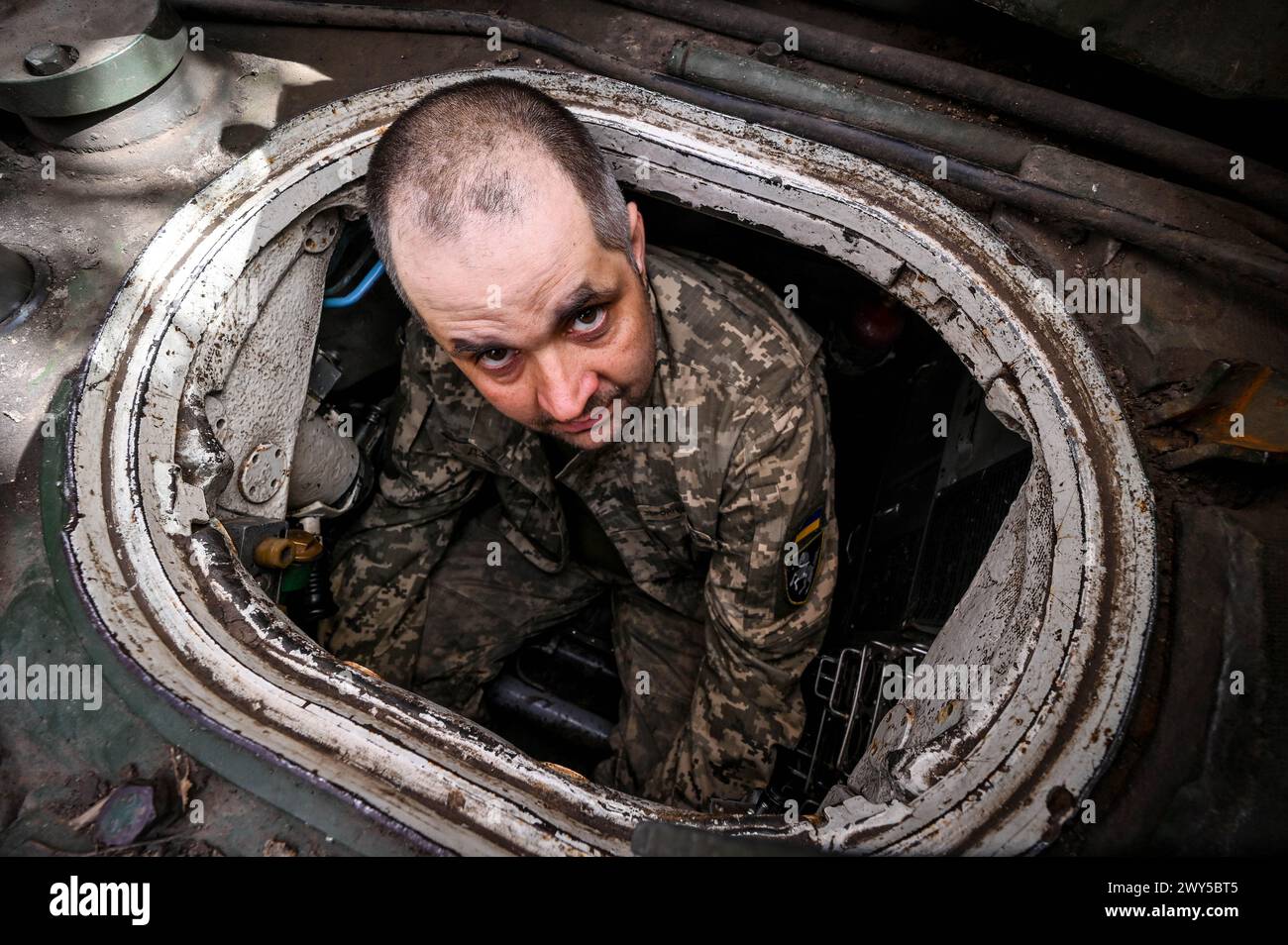 UKRAINE - MARCH 31, 2024 - A serviceman of the 1st Tank Brigade of the ...