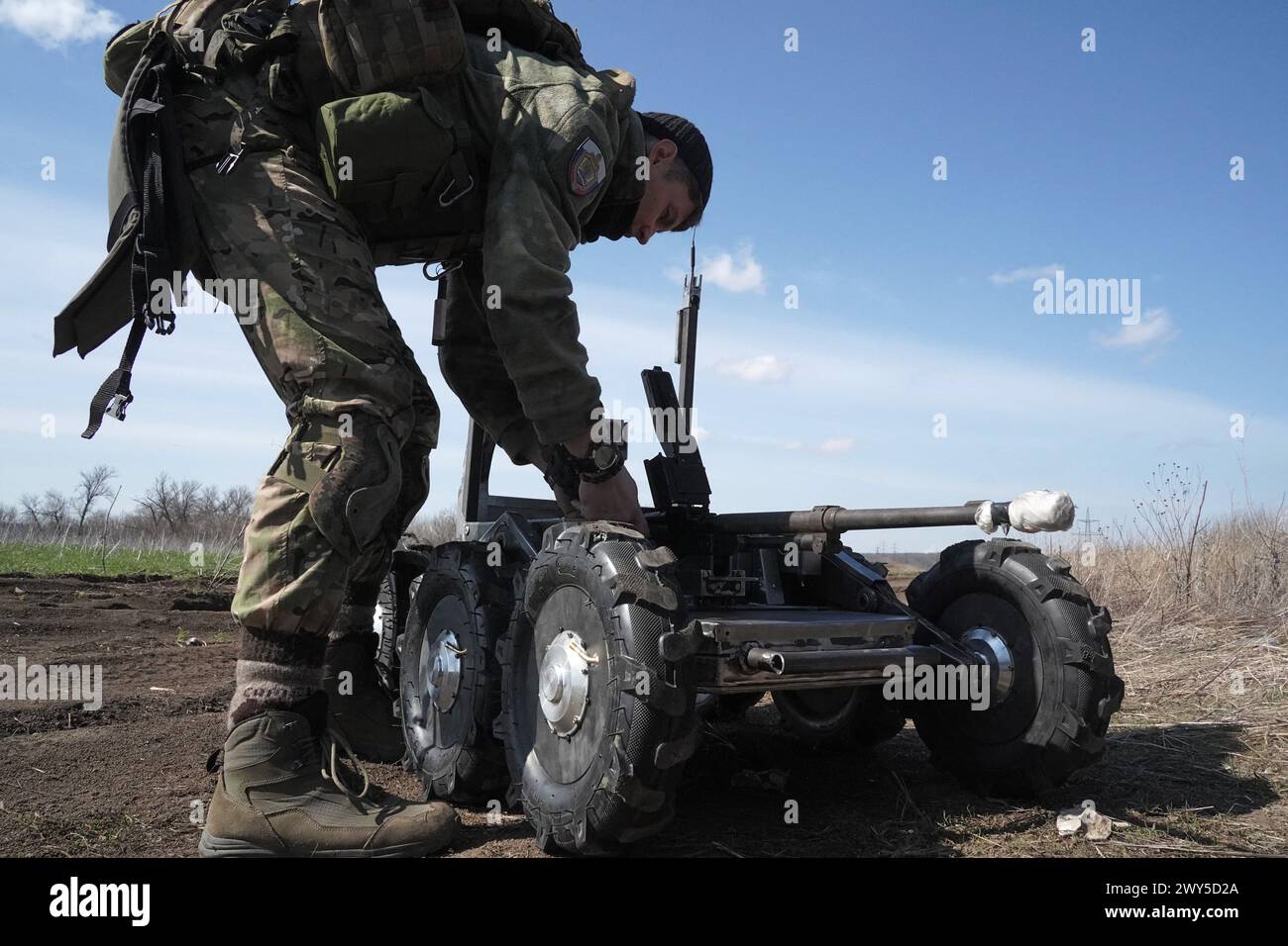 Soldiers of the Archangel Michael unit during testing of assault robots ...