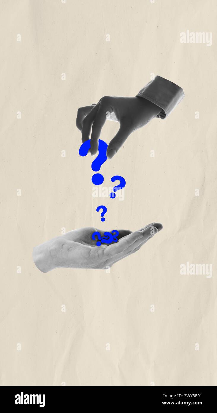 Human hand putting question marks on another hand meaning importance of ...