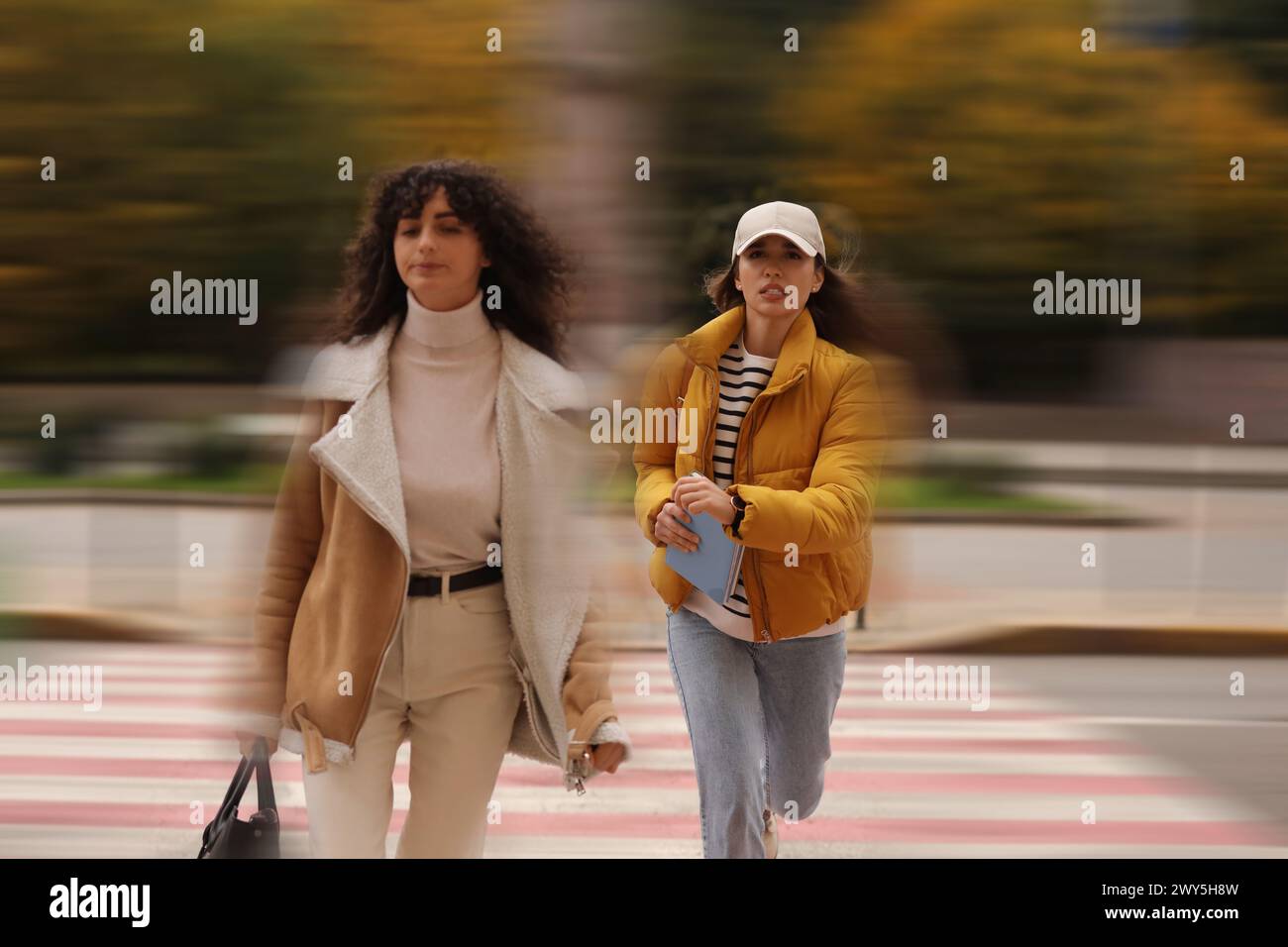 Being late. Students running for class outdoors. Motion blur effect ...