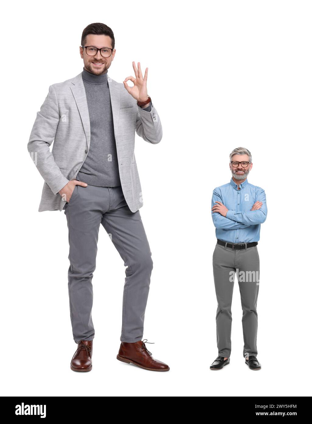Happy giant boss and small man on white background Stock Photo - Alamy