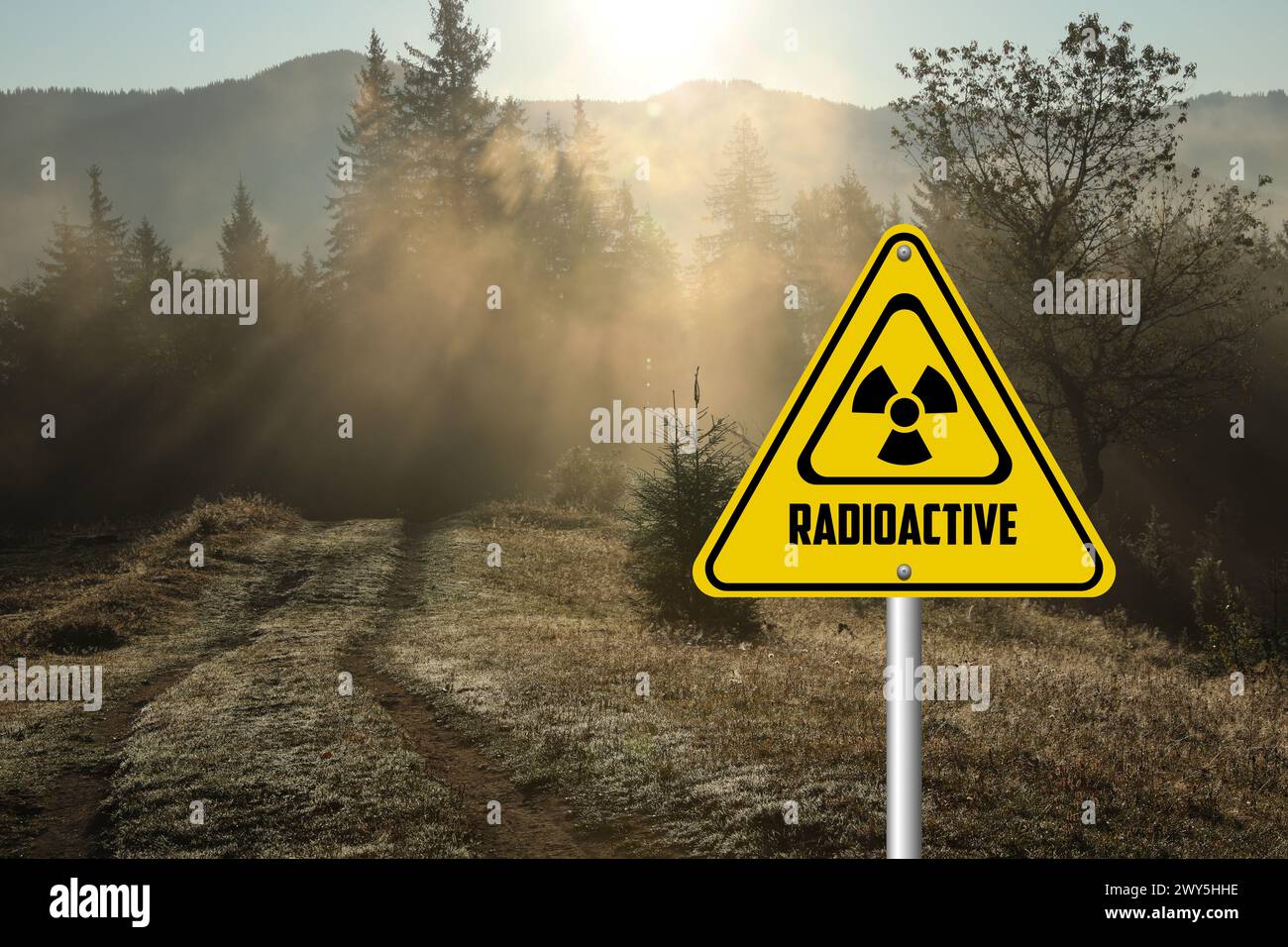 Radioactive pollution. Yellow warning sign with hazard symbol in ... Radioactive pollution. Yellow warning sign with hazard symbol in ...