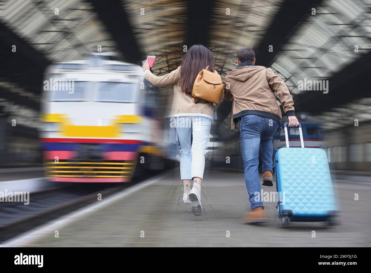 Man running after train hi-res stock photography and images - Alamy