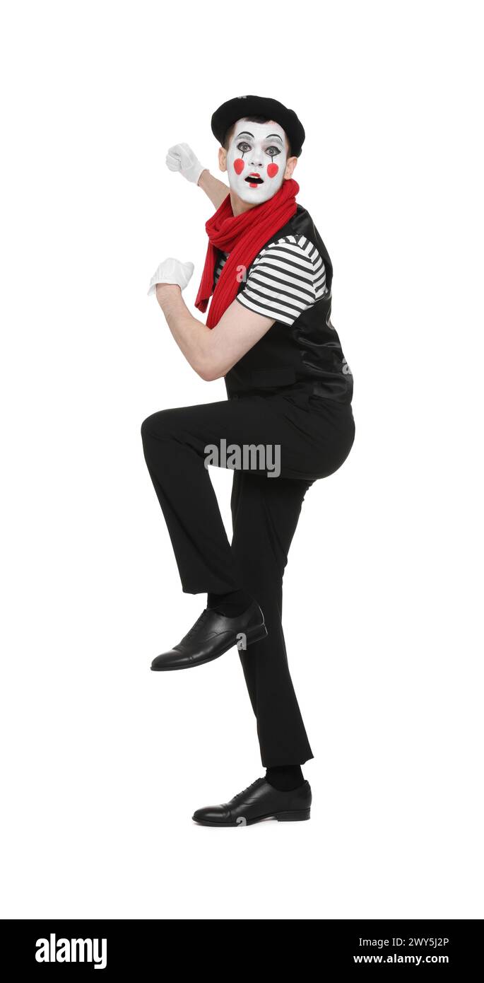 Funny mime artist in beret posing on white background Stock Photo - Alamy