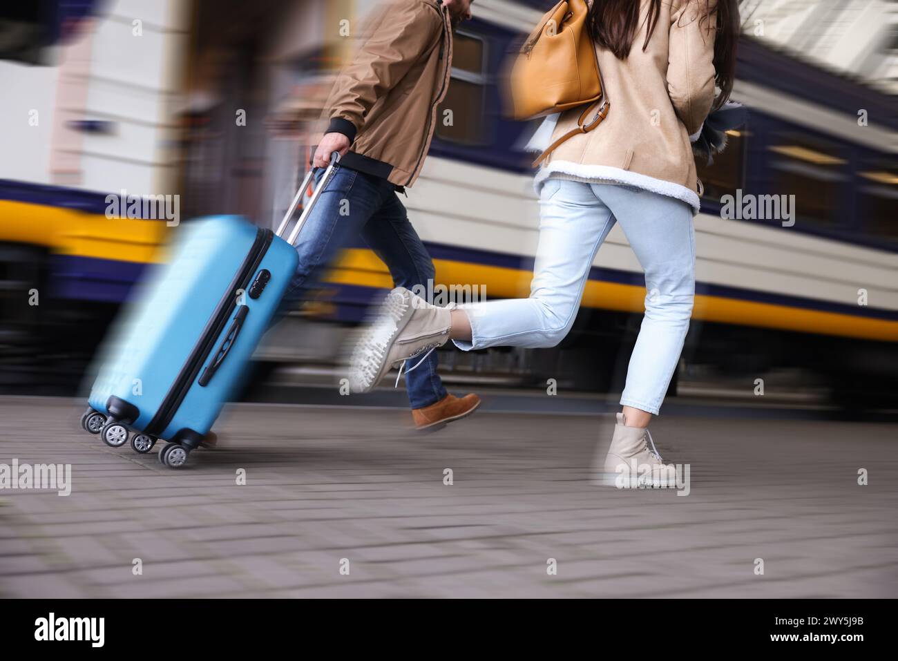 Man running after train hi-res stock photography and images - Alamy