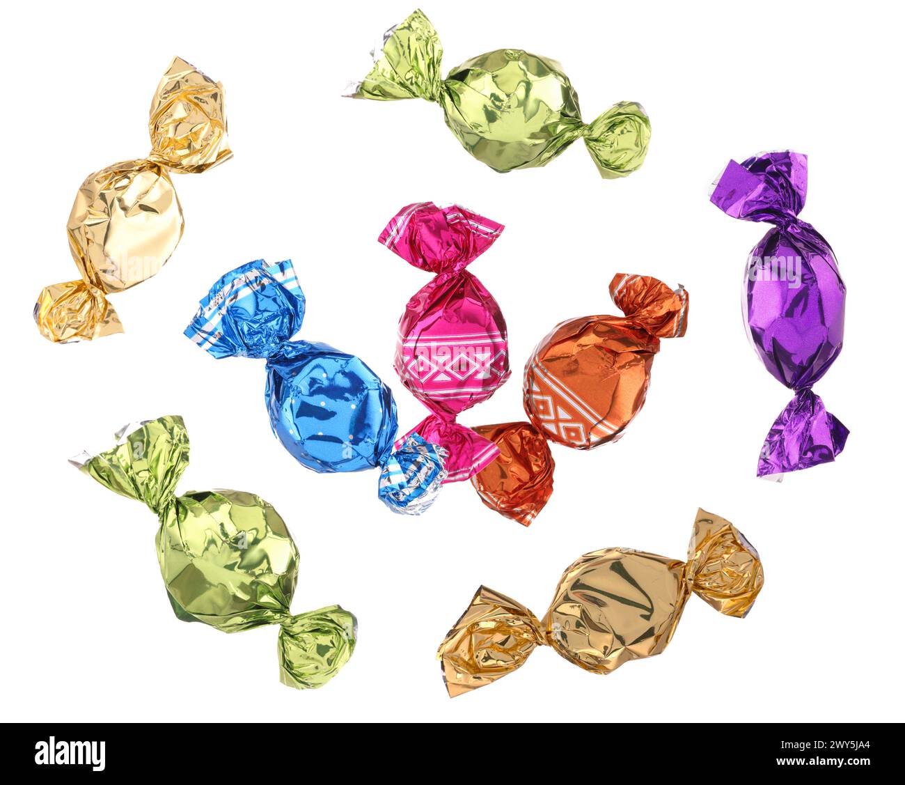 Candies in bright wrappers falling on white background Stock Photo - Alamy