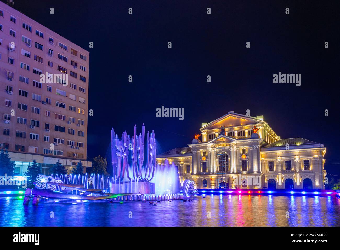 Night view of the kinetic fountain and the palace of culture in Drobeta ...