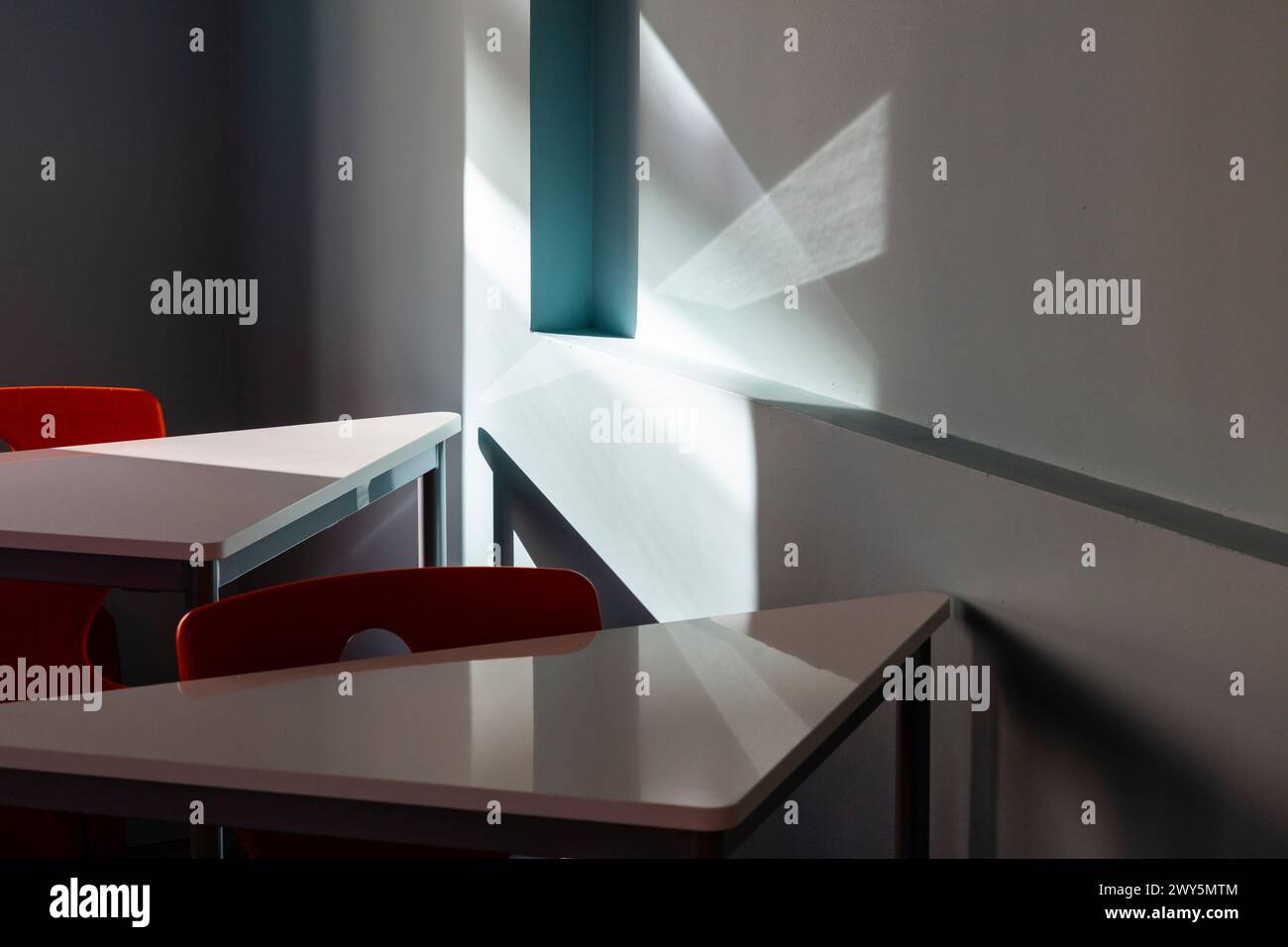 Re-furbished class room detail with sun reflecting on to the wall. John ...