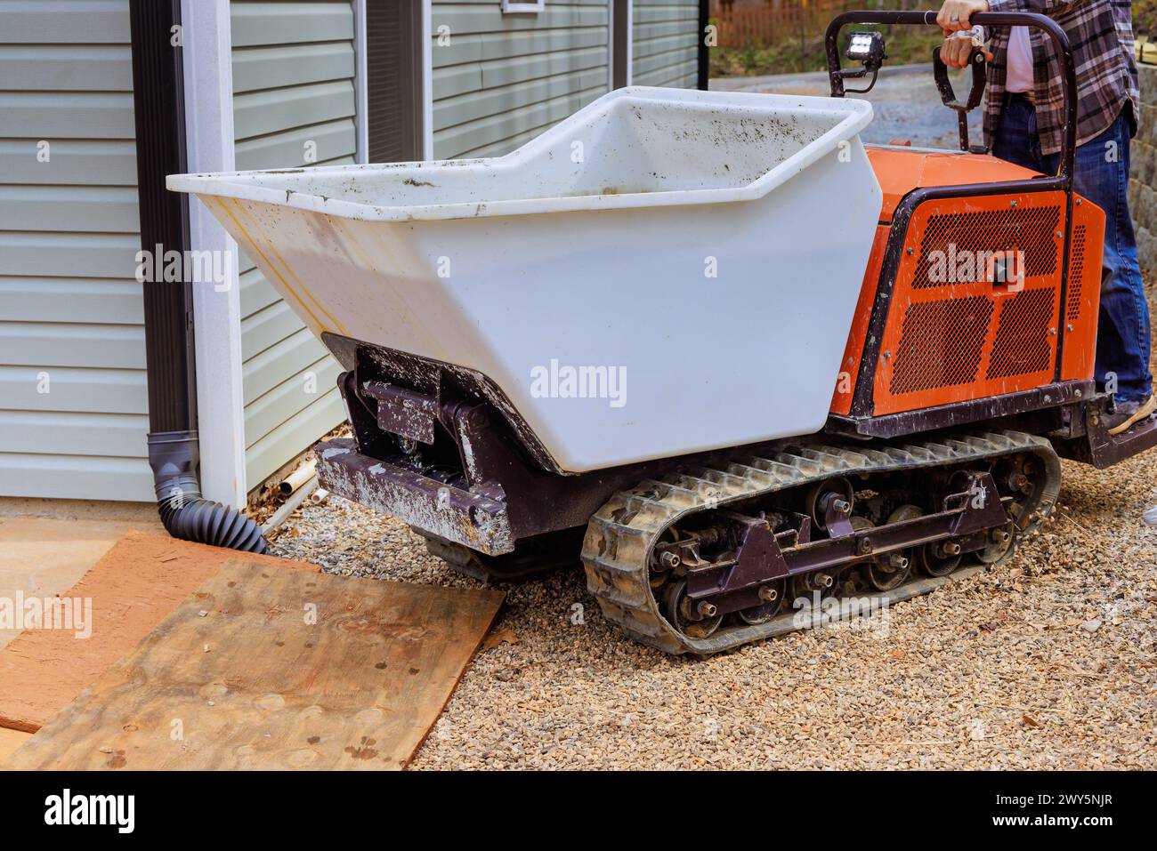 Utilization of self dumping rubber track concrete truck for ...