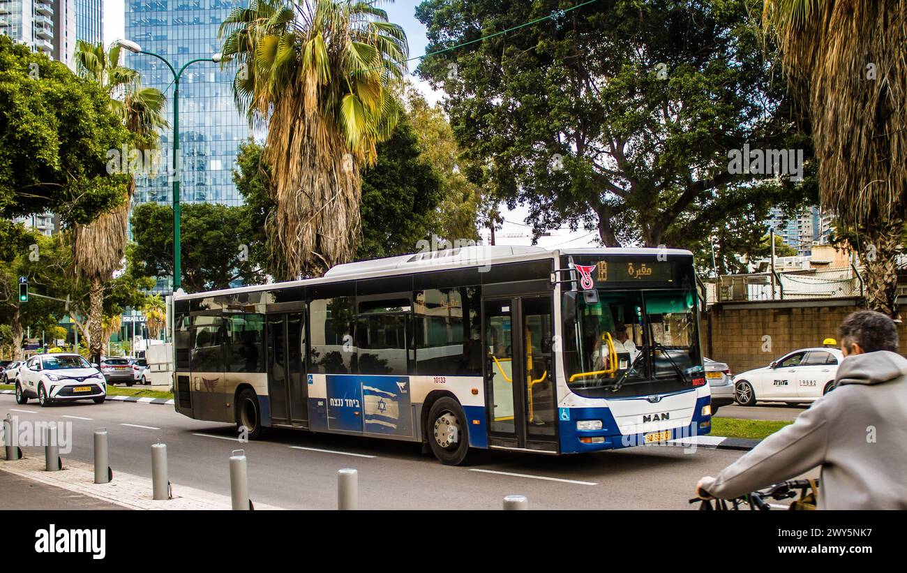 Tel Aviv, Israel - January 28, 2024 Local bus driving in the downtown ...