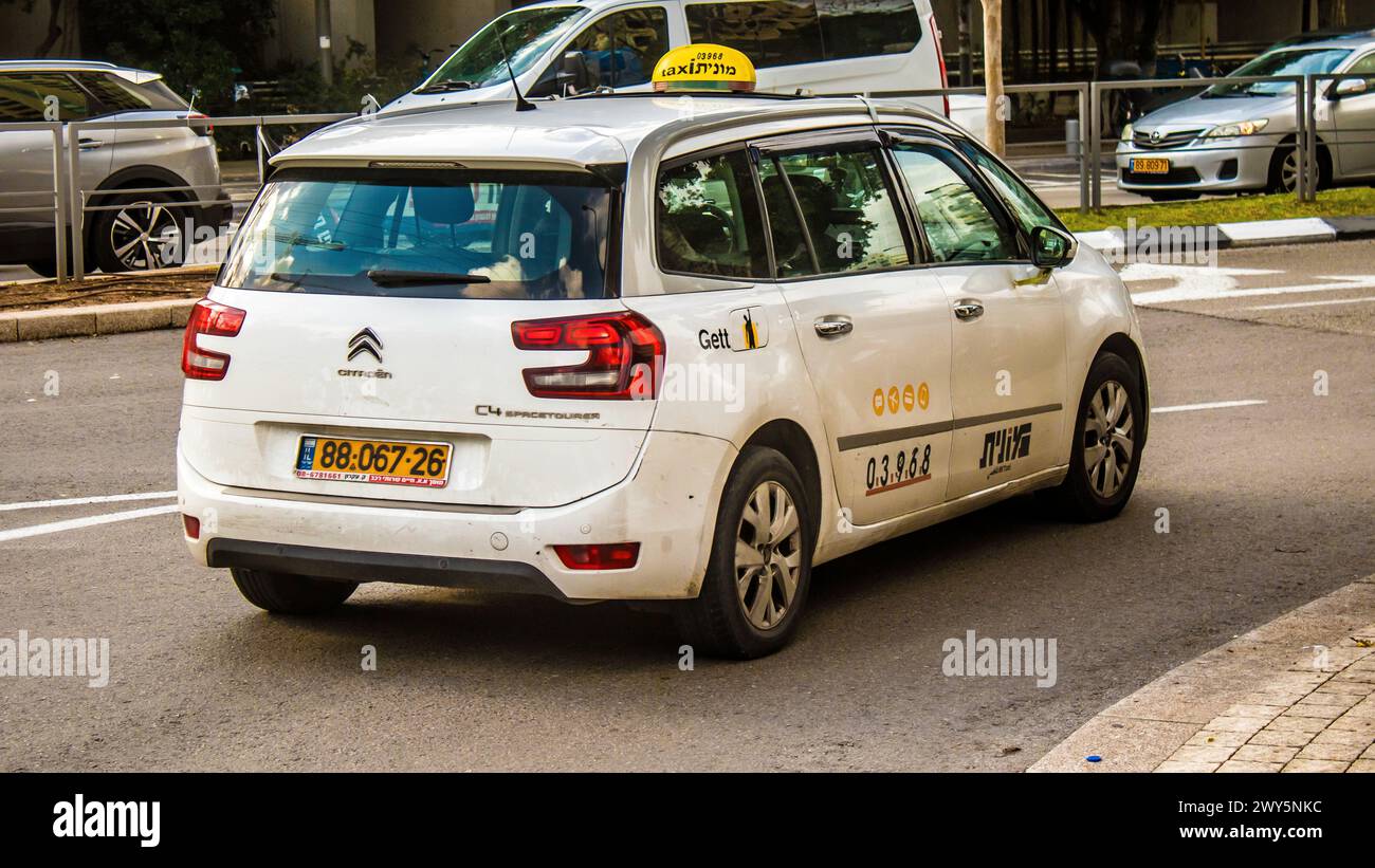 Tel Aviv, Israel – January 28, 2024 Israeli taxi driving in the streets ...