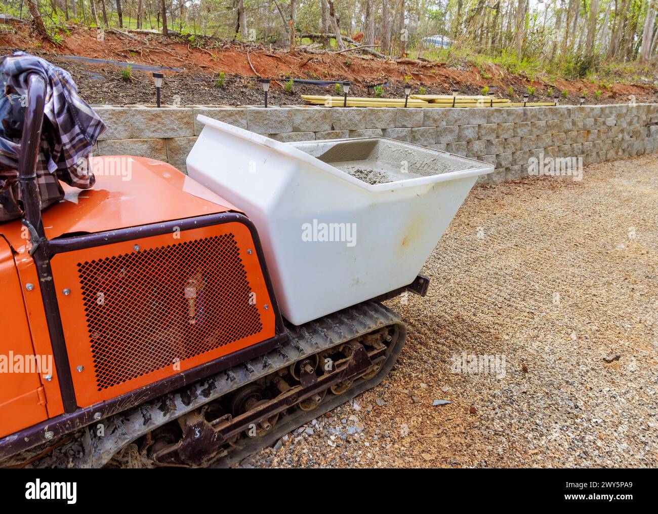 Transportation of concrete at construction site using self dumping ...