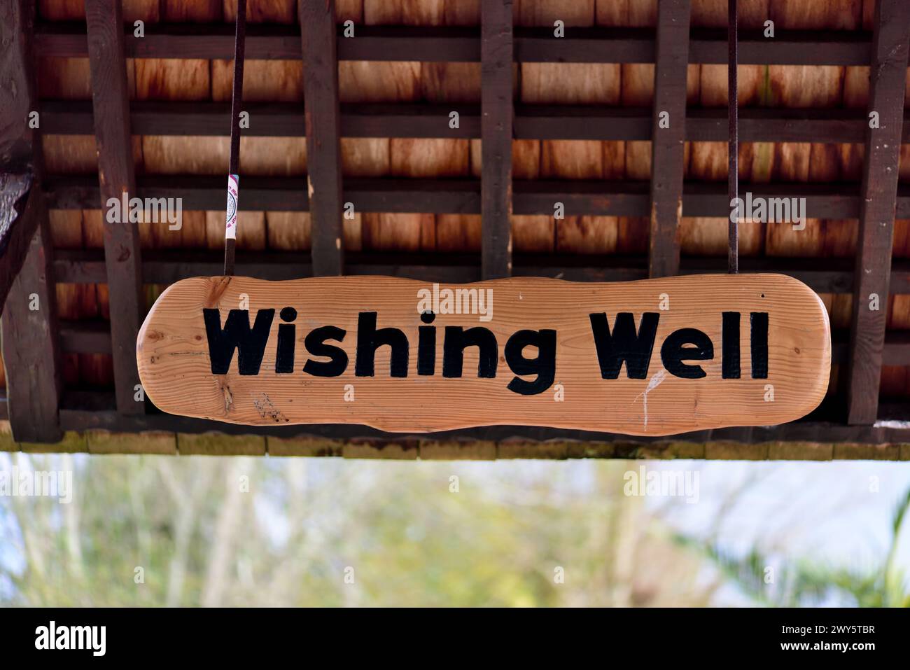 A Wishing Well sign at Paignton Zoo Stock Photo - Alamy