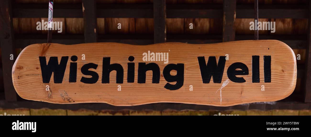 A Wishing Well sign at Paignton Zoo Stock Photo - Alamy