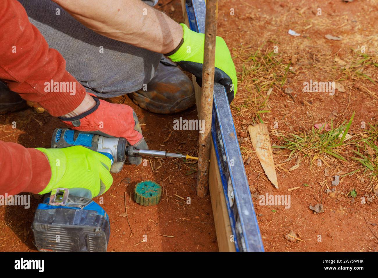 Production of formwork for concrete base foundation house with use ...