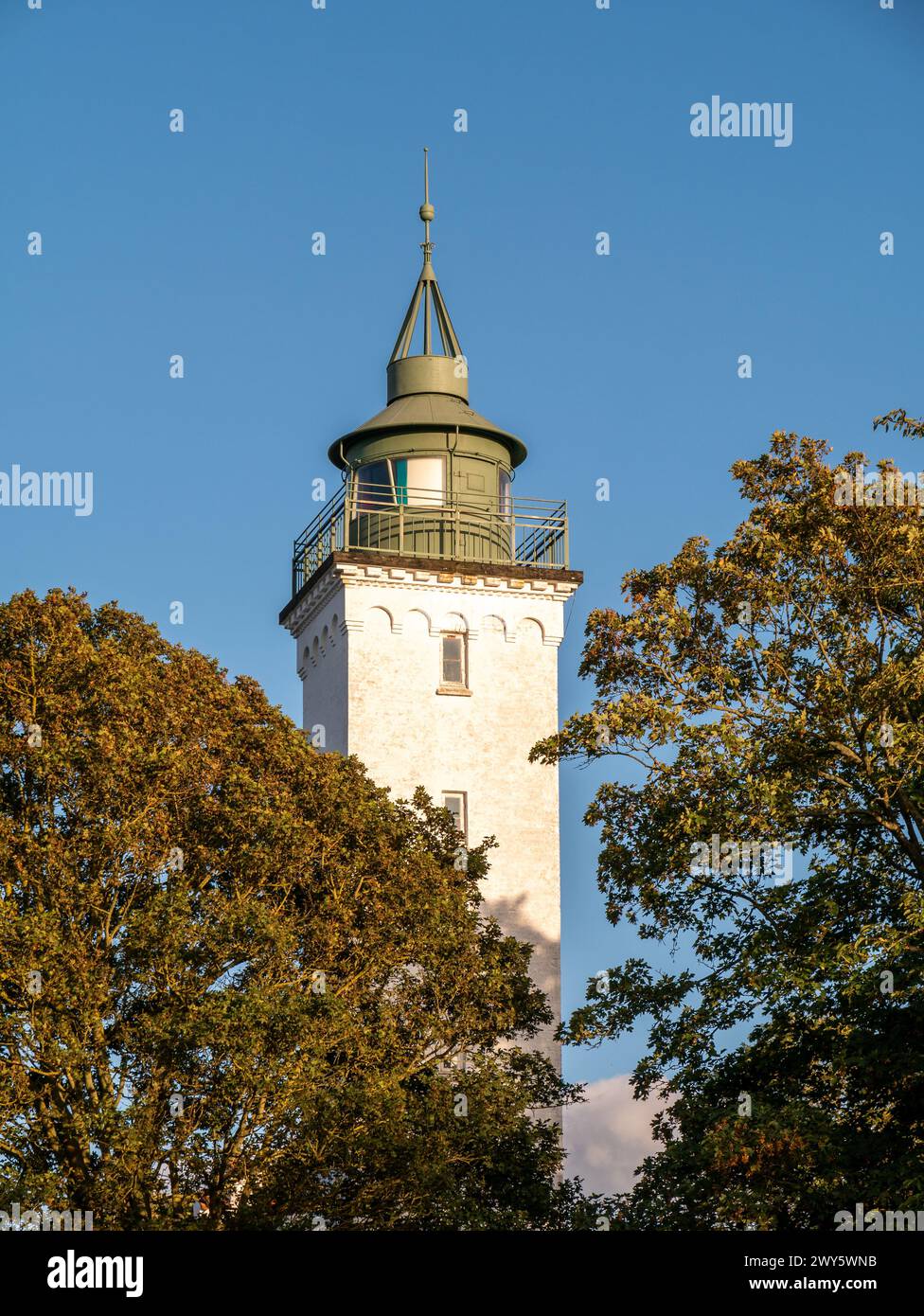 Tower of church and lighthouse of Tunø island in town of Tunø By ...